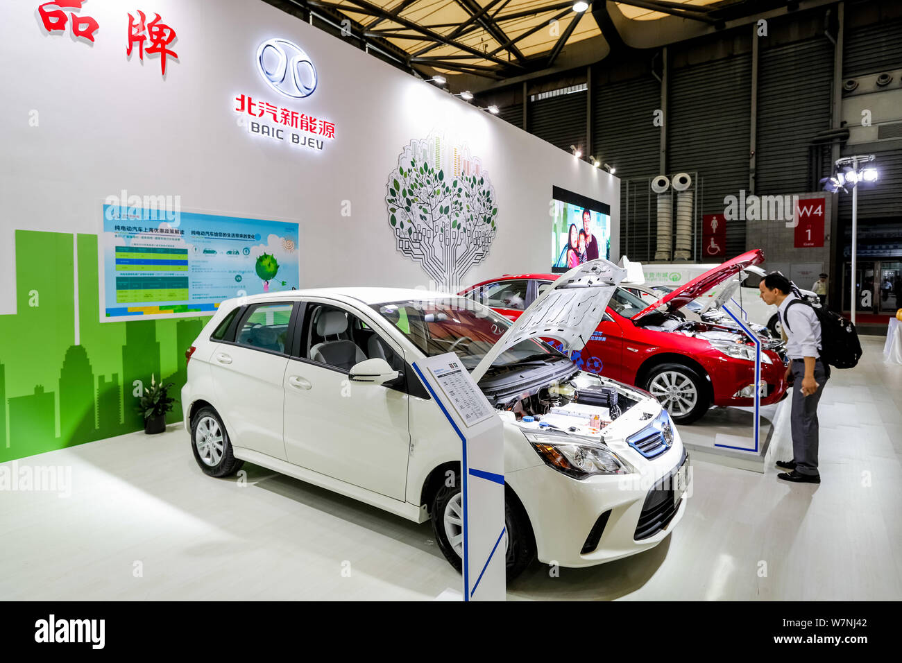 --FILE--Electric cars are on display at the stand of BAIC BJEV during an automobile exhibition ...