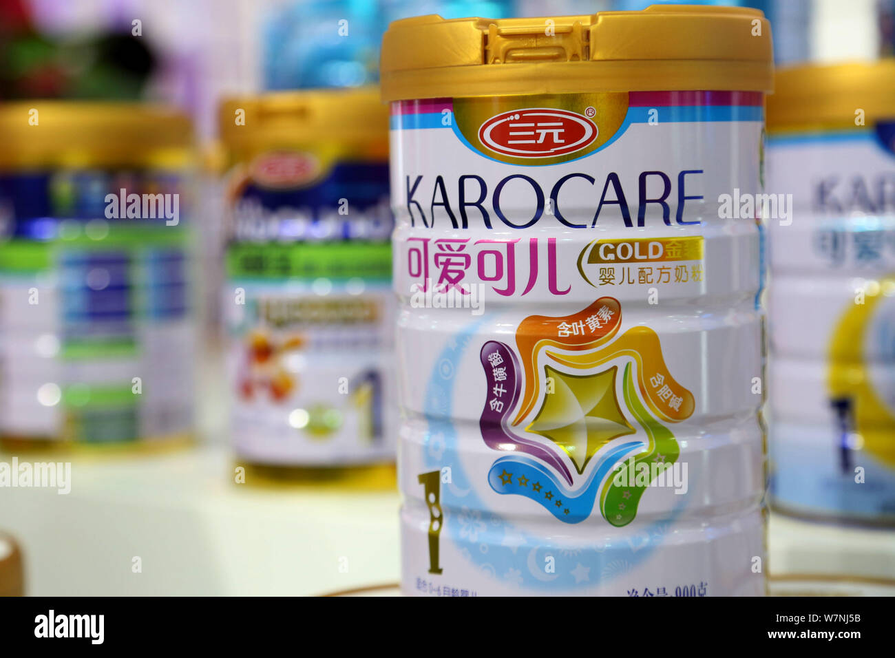 --FILE--A tin of Sanyuan milk powder is pictured at the stand of ...