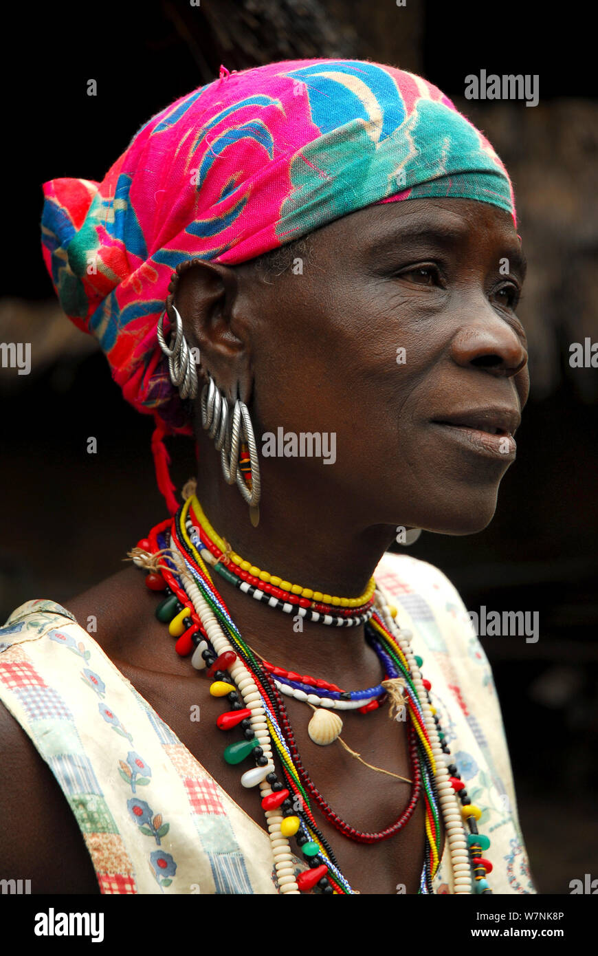 Bedik woman with traditional necklaces and beads. Bassari country, east ...