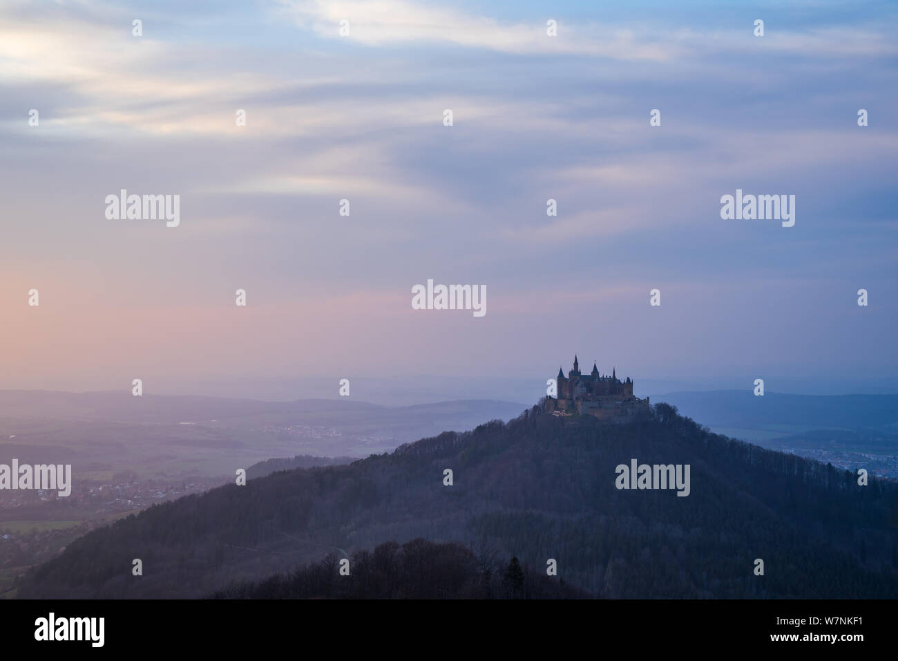 Germany, Hohenzollern castle in misty sunset atmosphere in springtime ...