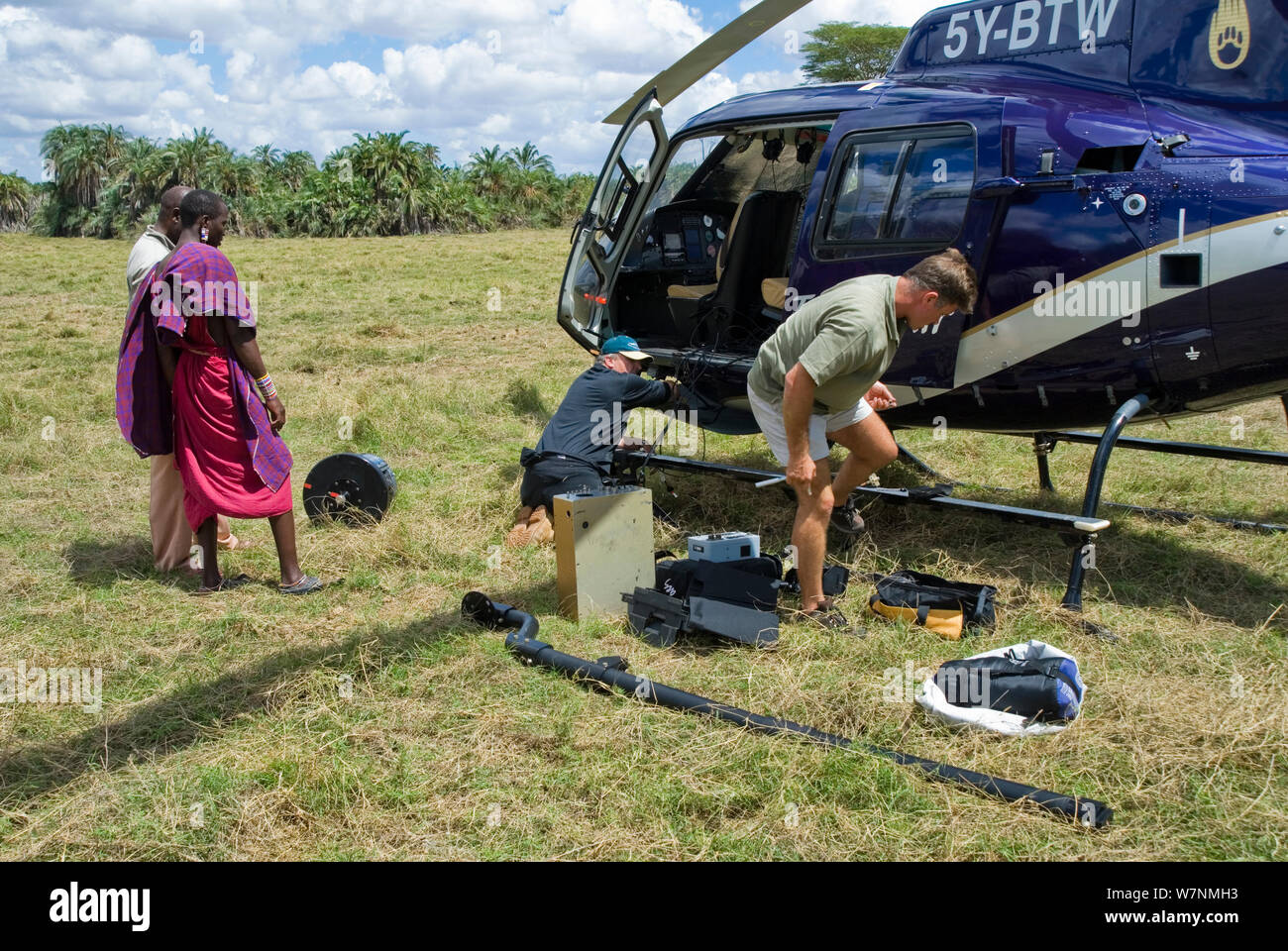 Simon Werry and Mike Watson derigging Cineflex camera from helicopter ...
