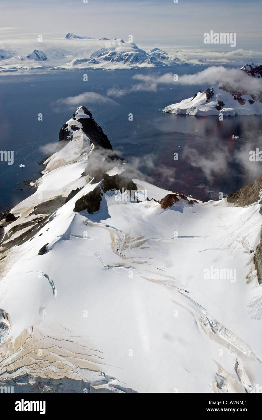 Aerial view of coast of Antarctic Peninsula. February 2008. Taken on ...