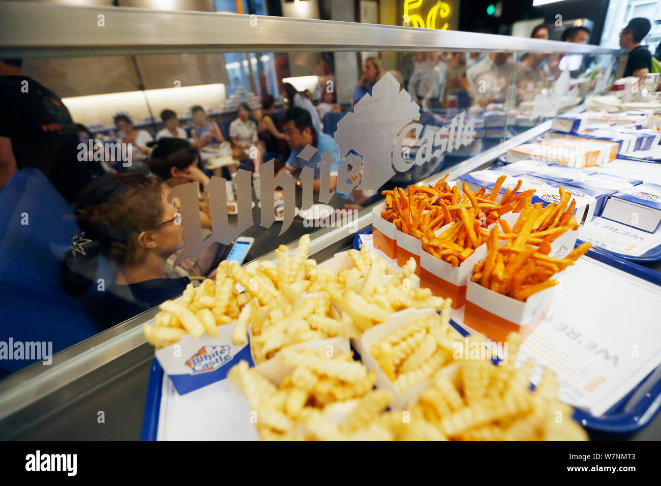 French fries served to customers are pictured at a newly-open White ...