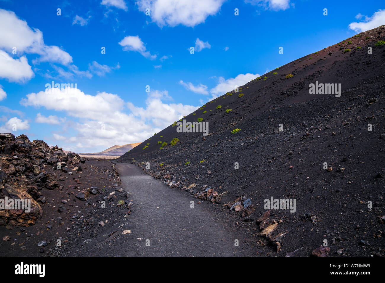 Spain, Lanzarote, Black lava hiking trail around volcano el cuervo ...