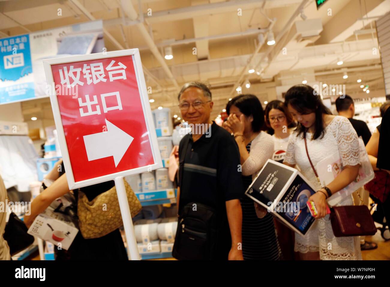 Chinese customers shop at the first flagship store of Japanese ...