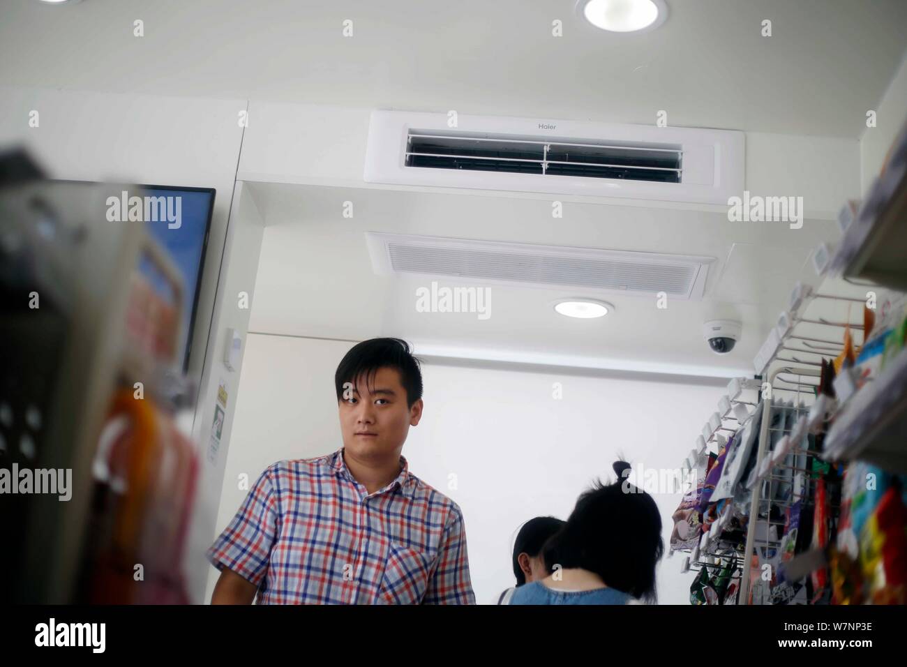 Customers shop at the BingoBox, an unmanned 24-hour and self-service ...