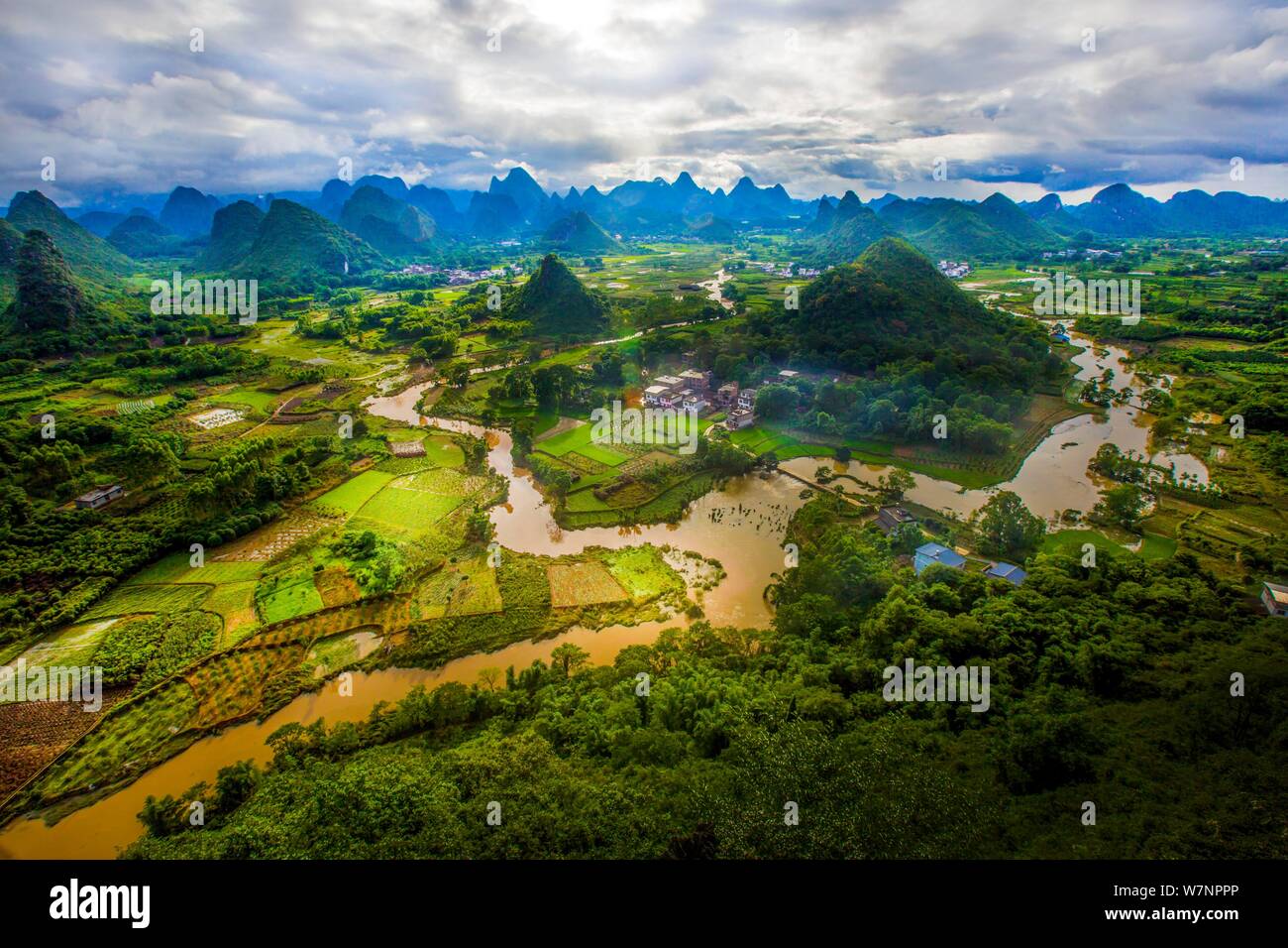 Aerial view of a flooded tributary of the Lijiang River (or Li River ...
