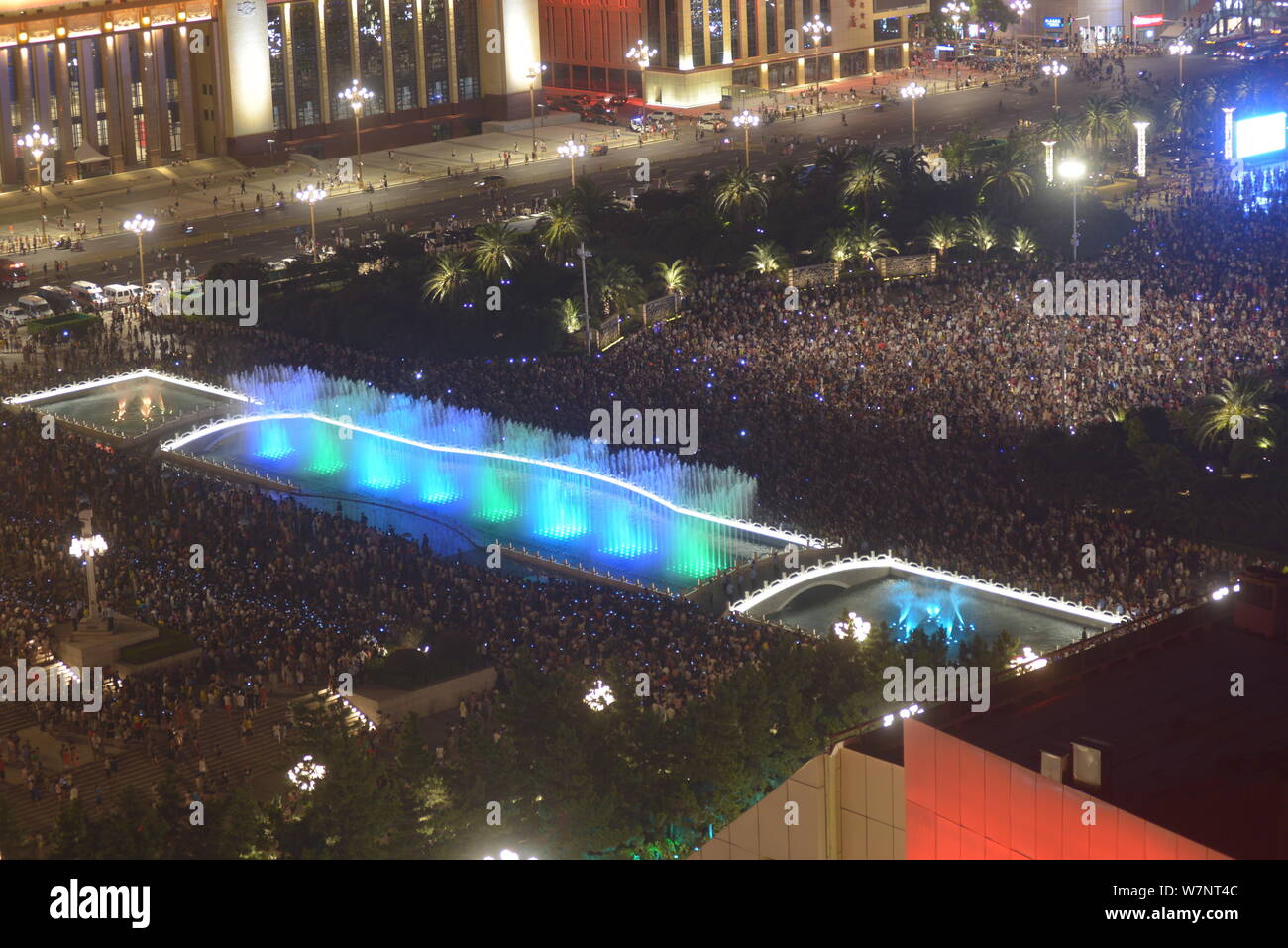 Local residents crowd Bayi Square during a celebration event to mark ...