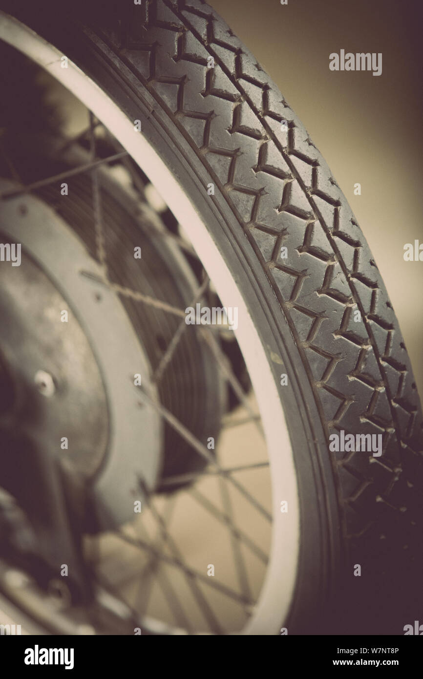 Color image of a vintage thin motorcycle wheel Stock Photo - Alamy