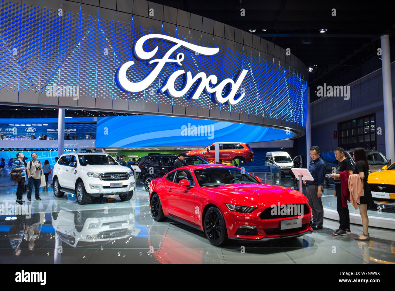 --FILE--Cars are on display at the stand of Ford during the 17th ...
