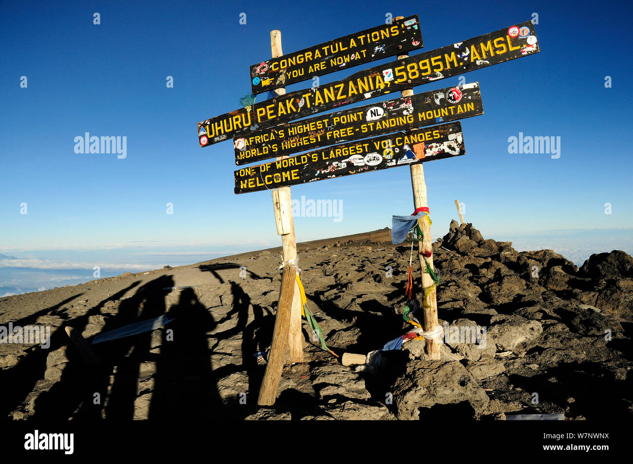 Board indicating Uhuru peak on Mount Kilimanjaro, Africa's highest point at 5895m altitude ...