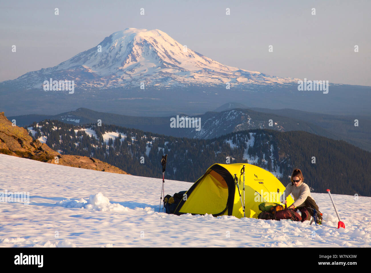 Woman at campsite at high altitude in the Goat Rocks Wilderness with a ...