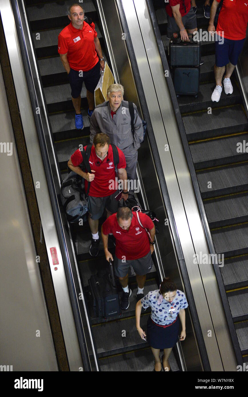 Players and coaching staff of Arsenal F.C. are pictured after arriving ...