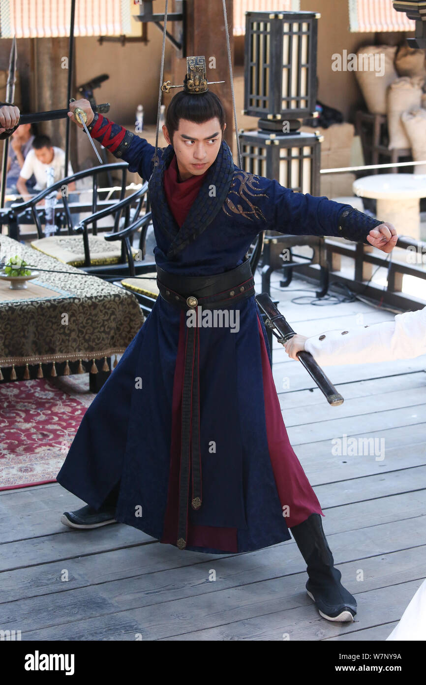 Taiwanese actor Chen Bolin is pictured during a filming session on set ...