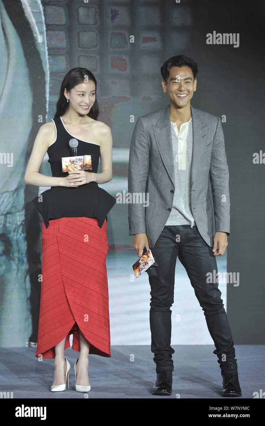 Chinese actress Ni Ni, left, and Taiwanese actor Eddie Peng attend a ...