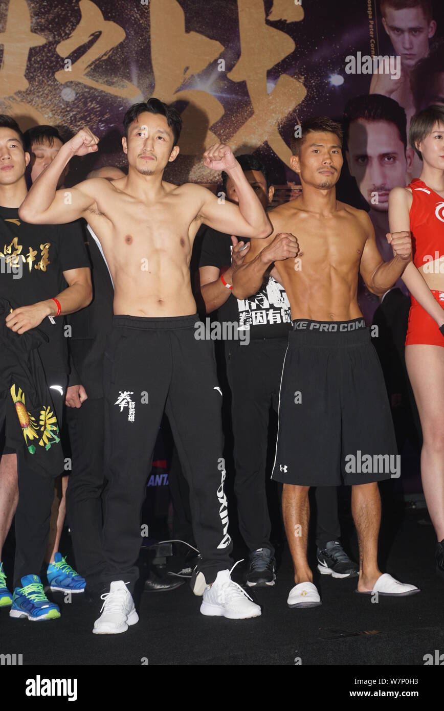 Chinese boxing star Zou Shiming, left, and Japanese boxer Sho Kimura ...