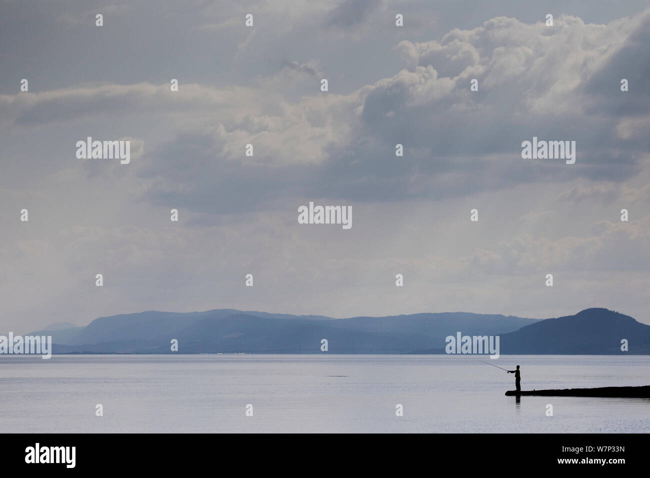 People fishing on shore hi-res stock photography and images - Alamy