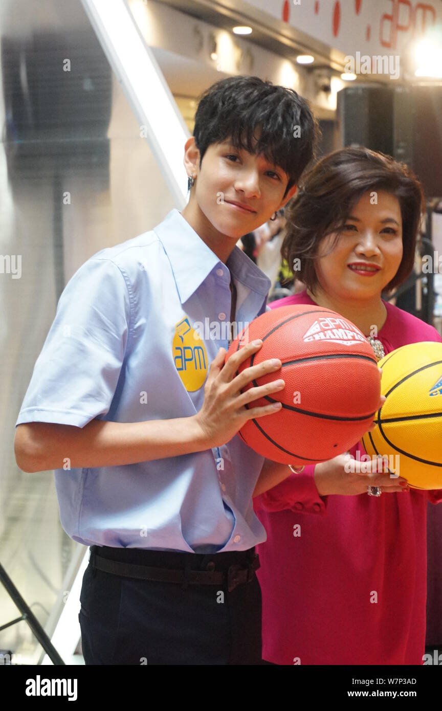 South Korea-based American singer Kim Samuel, left, attends an ...