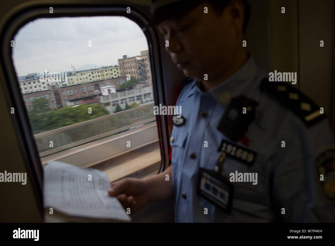 China train crew member hi-res stock photography and images - Alamy