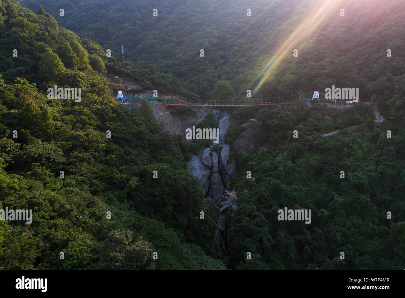 Aerial View Of The Mountain Crossing Suspension Glass Bridge At Mulan