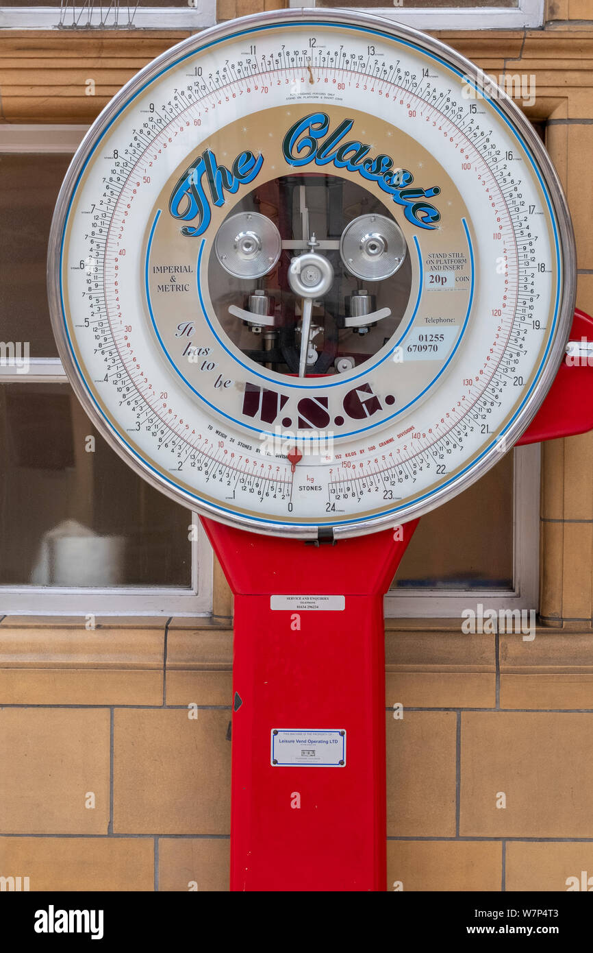 The Classic old fashioned machine for weighing yourself outside the ...