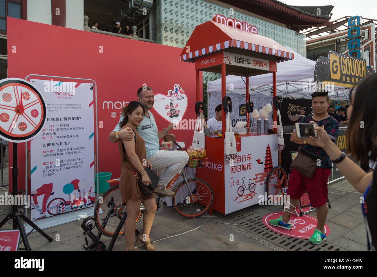 China foreign tourist bike hi-res stock photography and images - Alamy