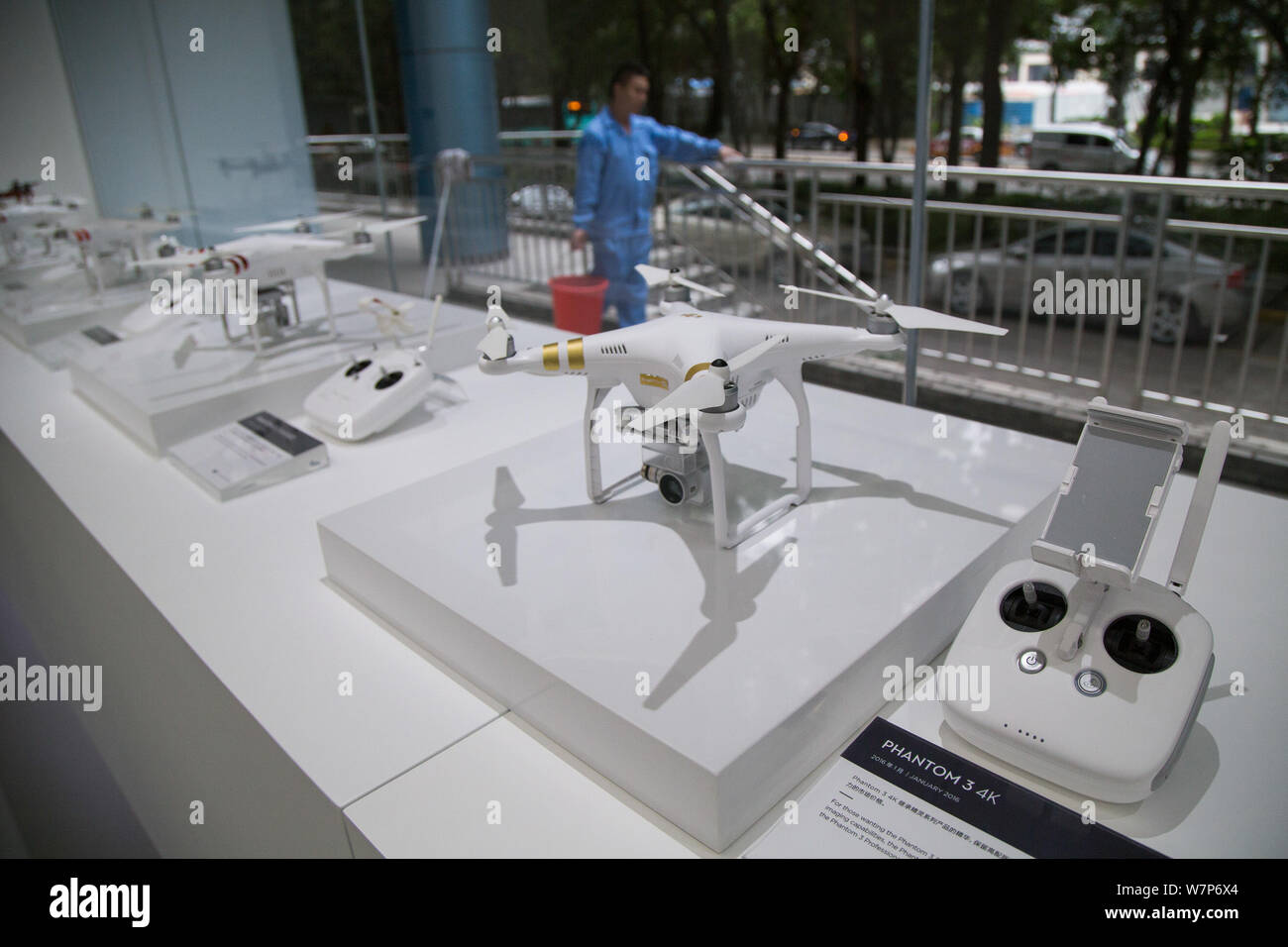 Drones are on display at the headquarters of DJI in Shenzhen city ...