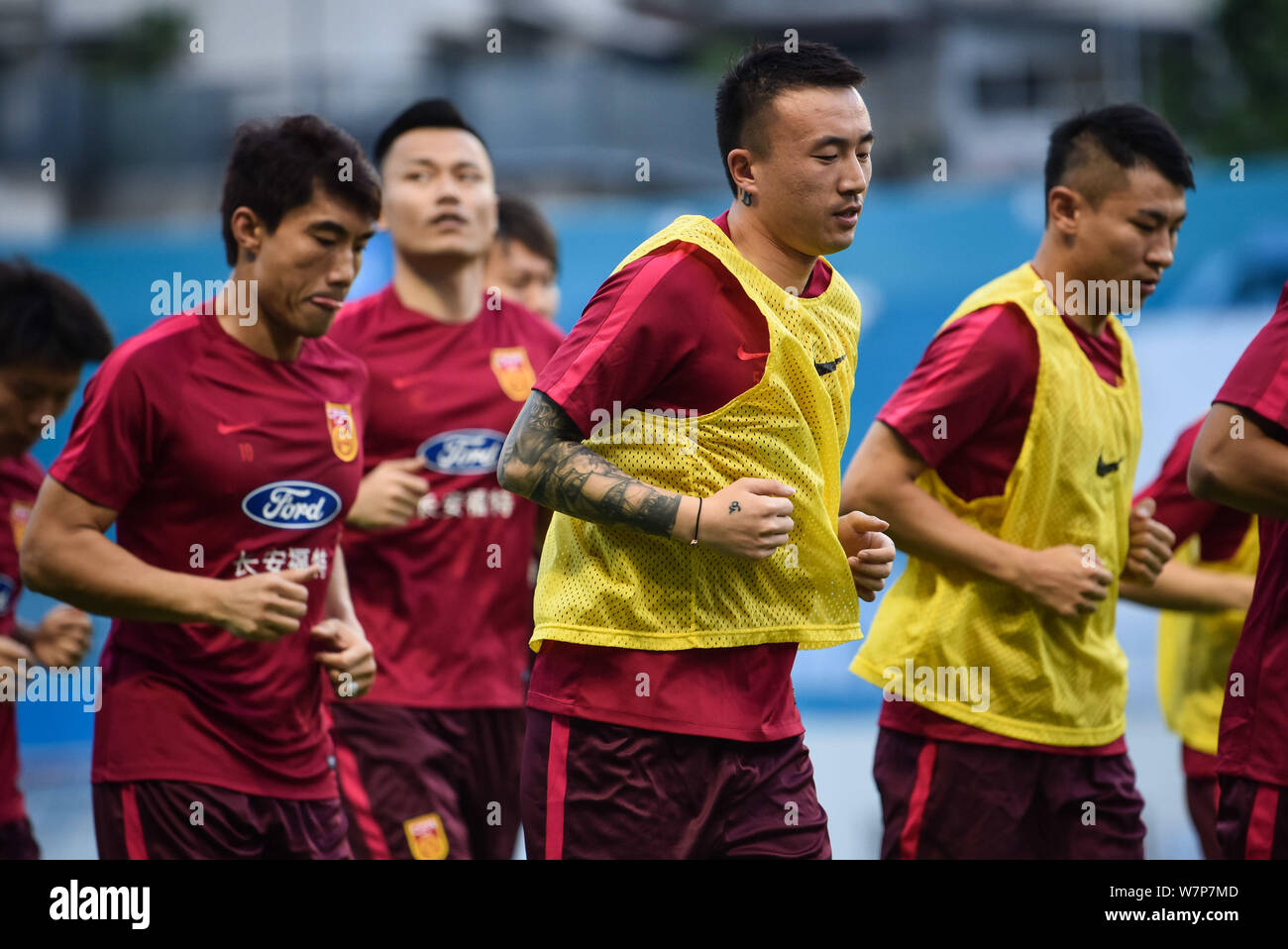 Players of Chinese national football team take part in a training ...