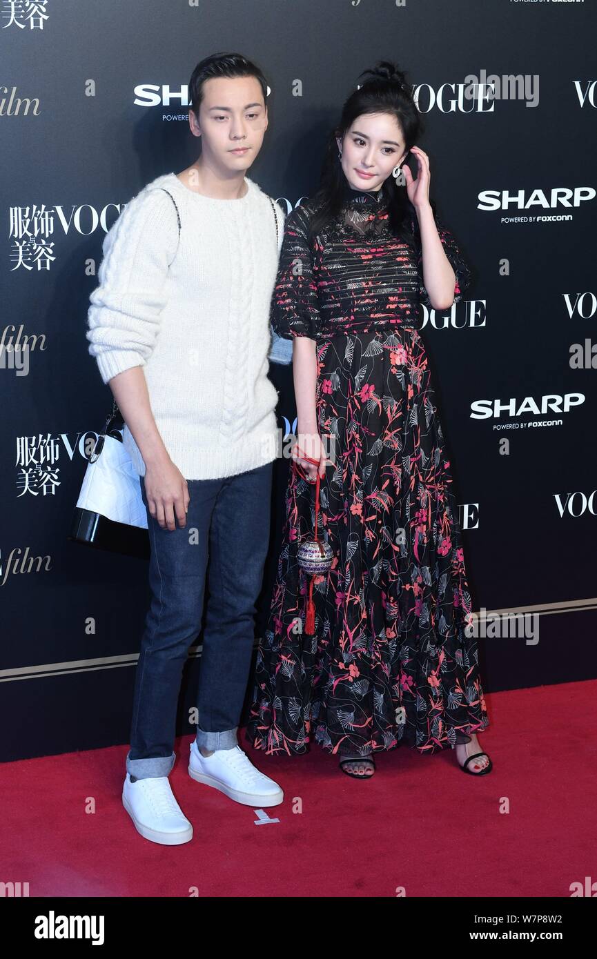 Hong Kong singer and actor William Chan, left, Chinese actress Yang Mi ...