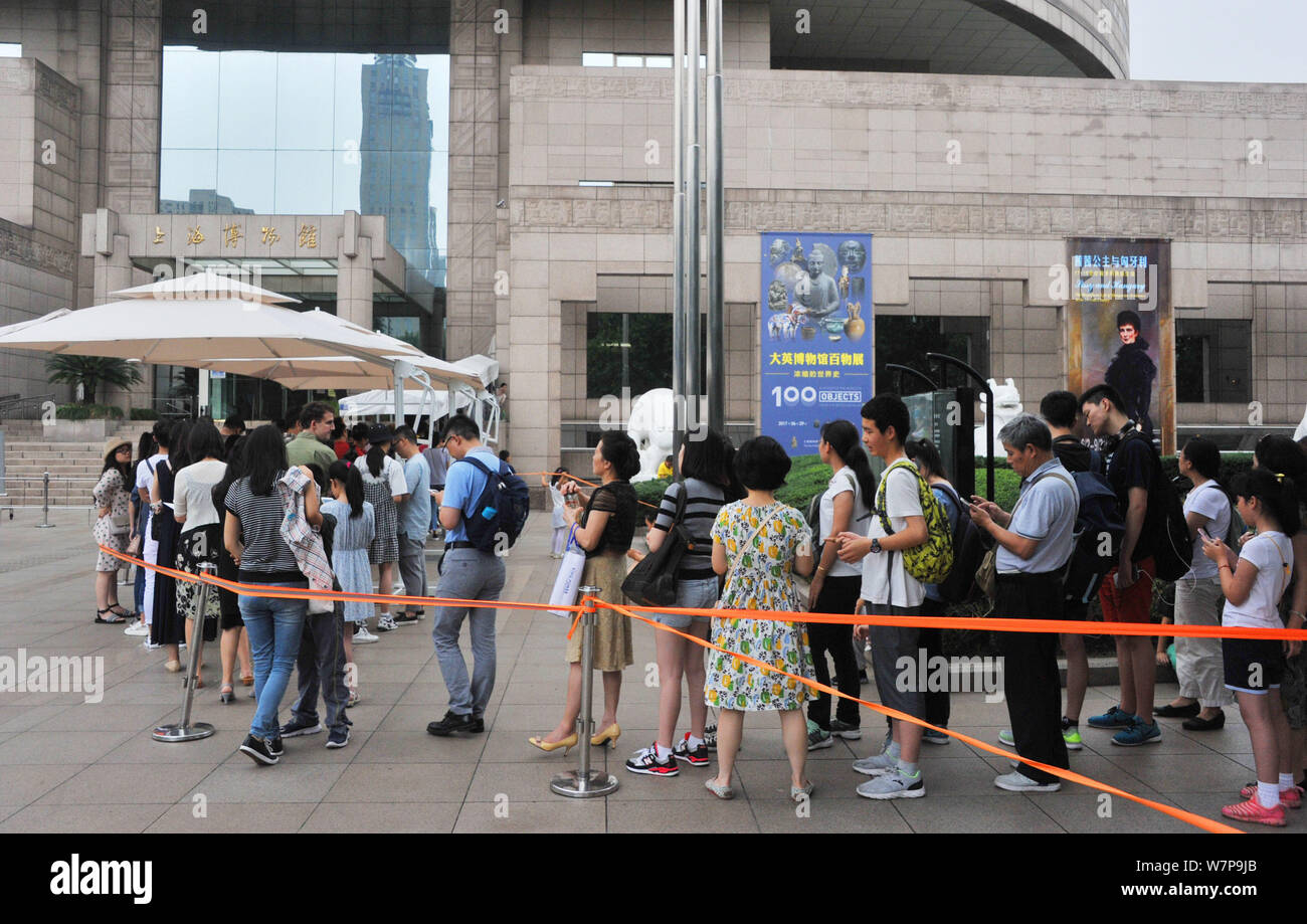 Visitors queue up in a long line to get into Shanghai Museum during the ...
