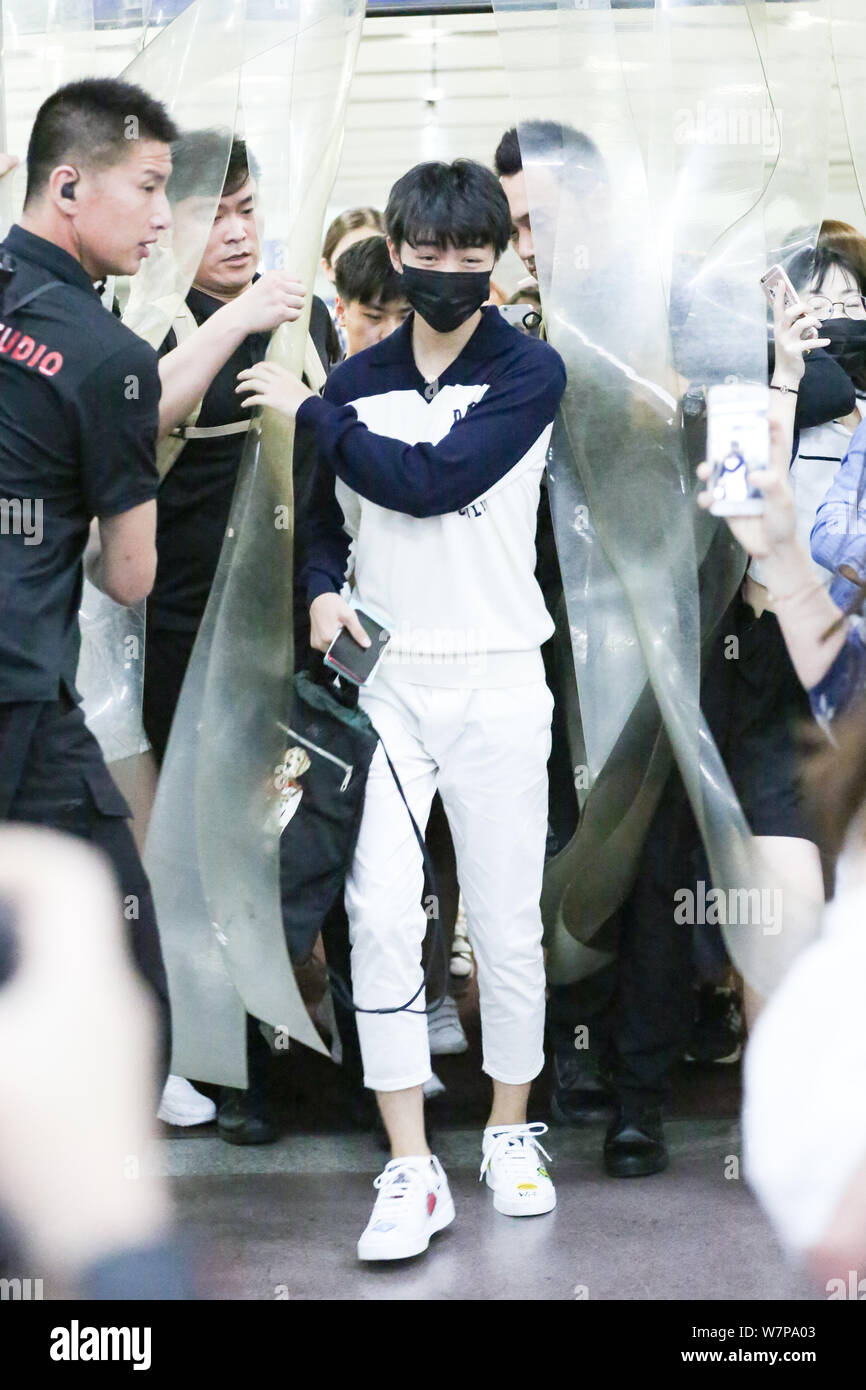 Karry Wang or Wang Junkai, center, of Chinese boy group TFBoys, is ...