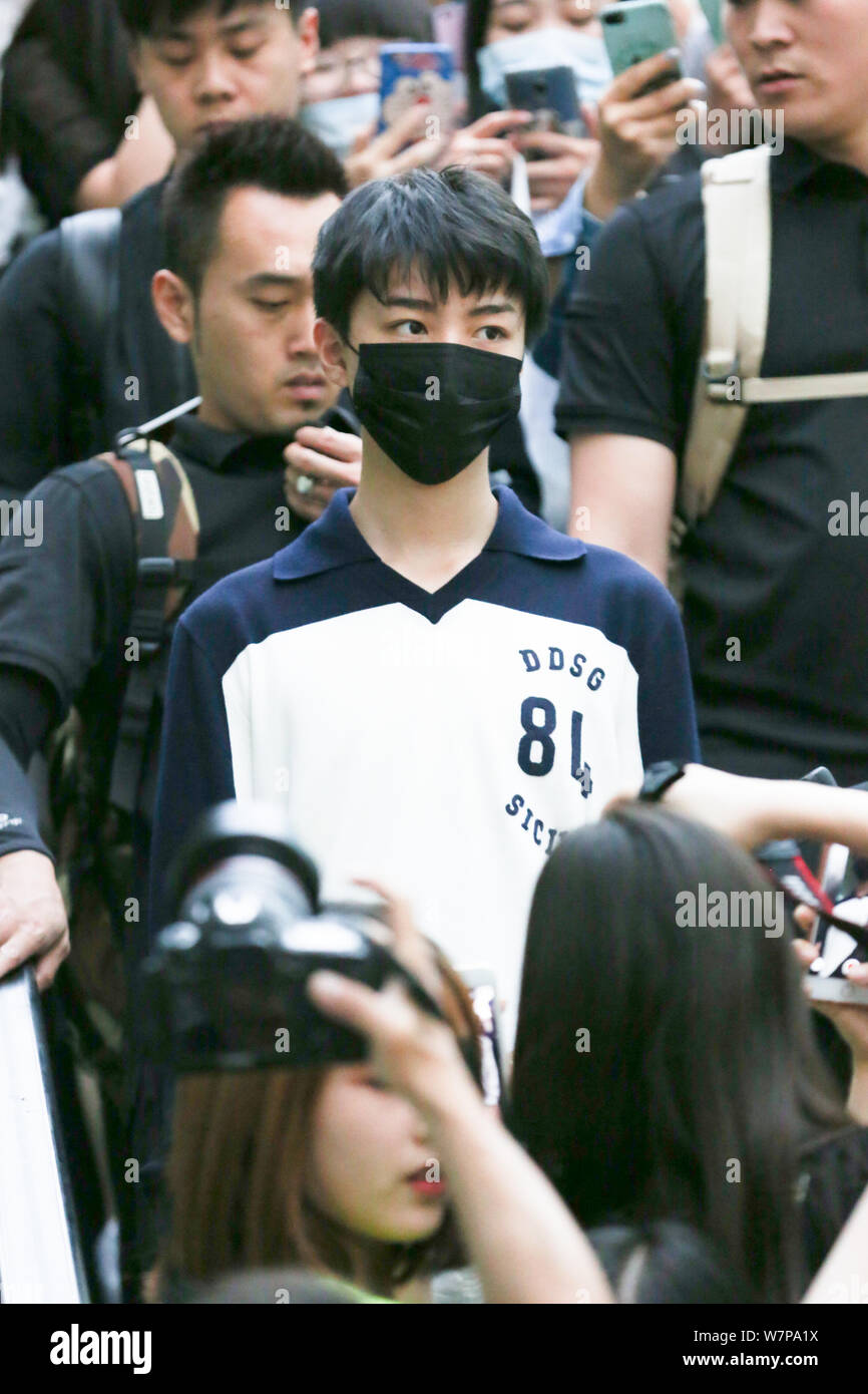 Karry Wang or Wang Junkai, center, of Chinese boy group TFBoys, is ...