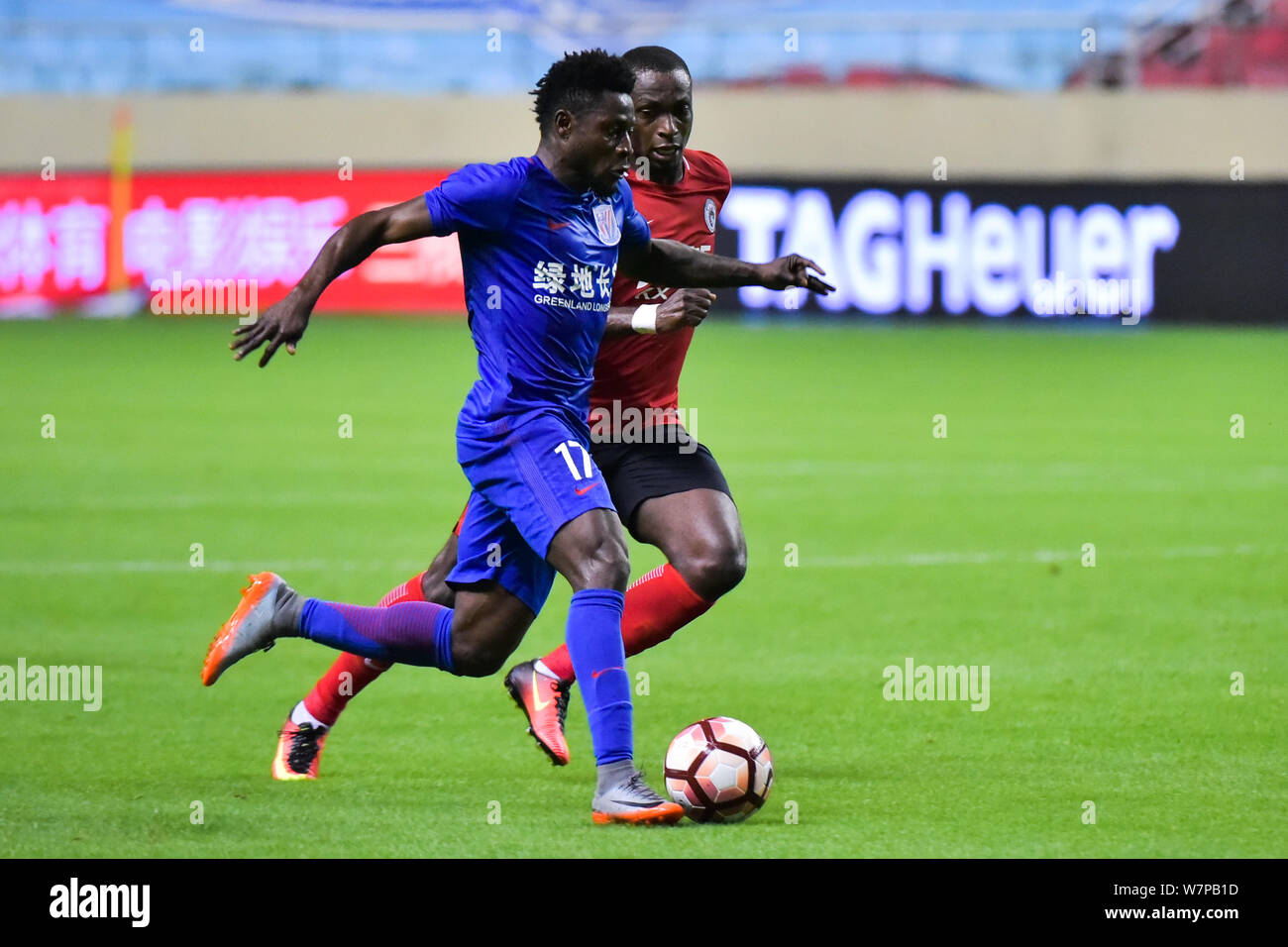 Nigerian football player Obafemi Martins of Shanghai Shenhua, left ...