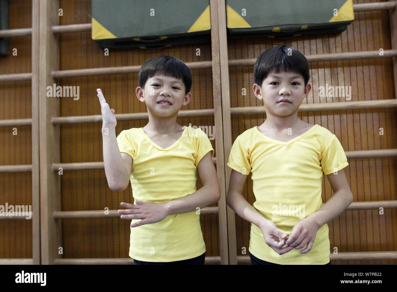 Young Chinese boys are pictured at a gymnastics and diving training ...