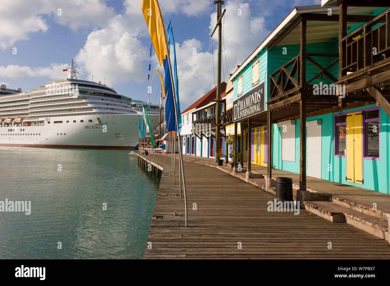 Large cruise ship docked alongside Heritage Quay shopping district in ...