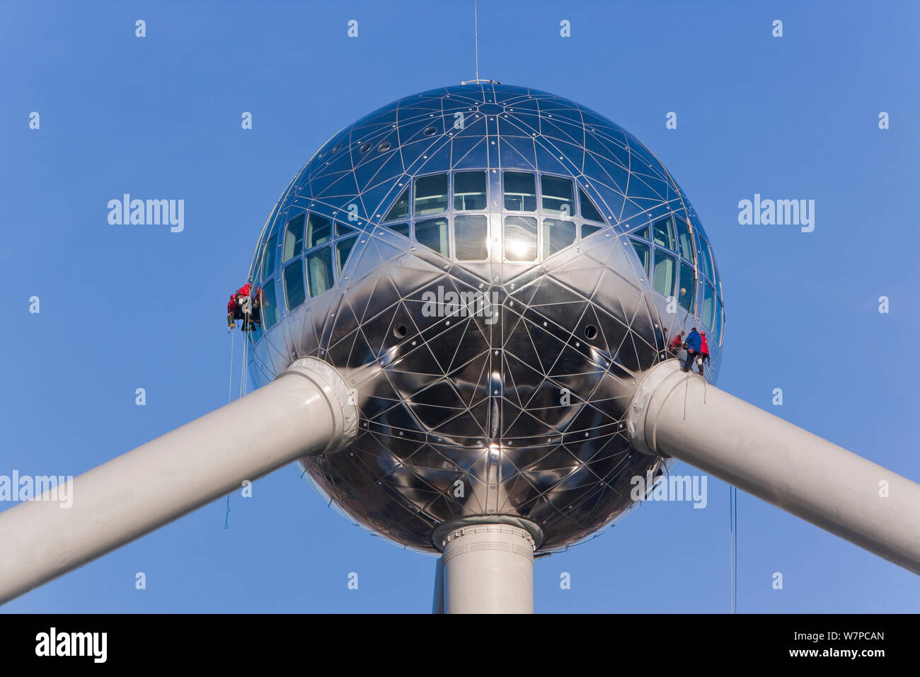 Atomium sculpture in Atomium Park, people working on the outside ...