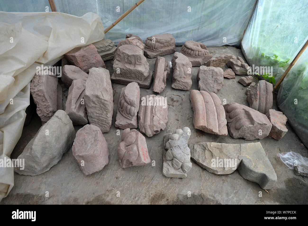 View of tablets inscribed with Buddhist scriptures unearthed from the ...