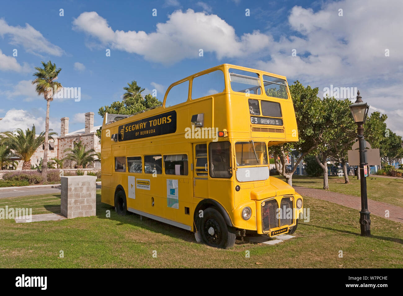 Old tourist yellow double decker bus outside Royal Naval Dockyard ...
