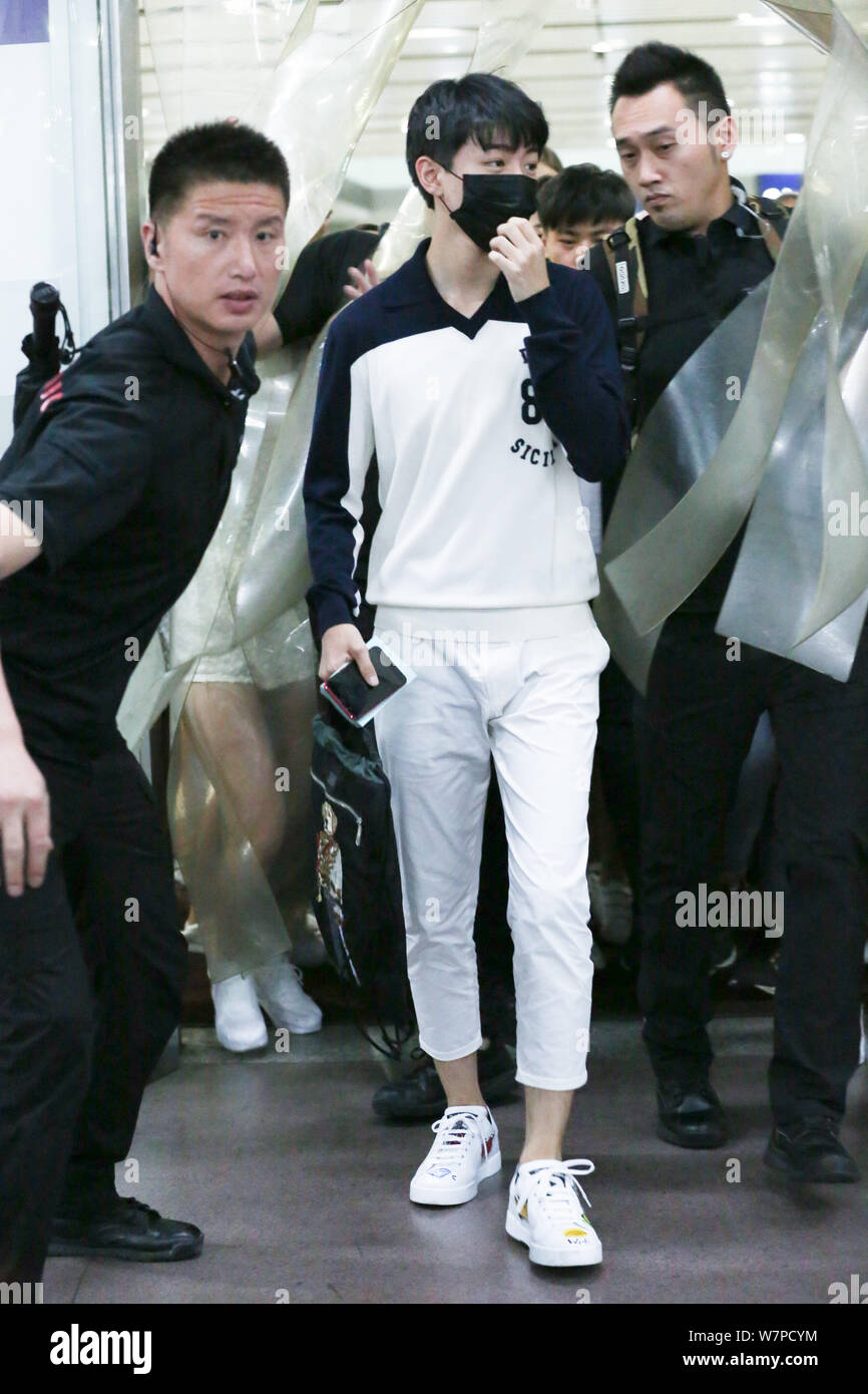 Karry Wang or Wang Junkai, center, of Chinese boy group TFBoys, is ...