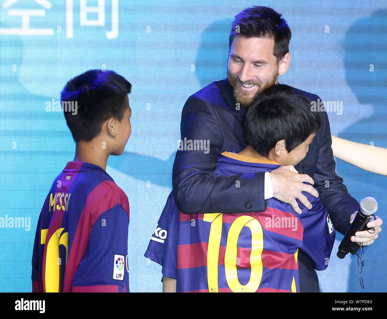 Argentinian striker Lionel Messi of FC Barcelona, right, interacts with ...