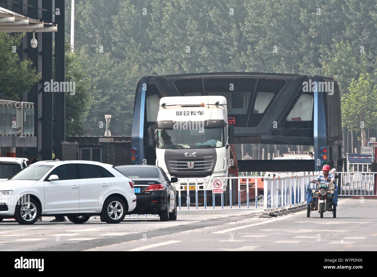 The Transit Elevated Bus (TEB) is to be tugged by a trailer from the ...