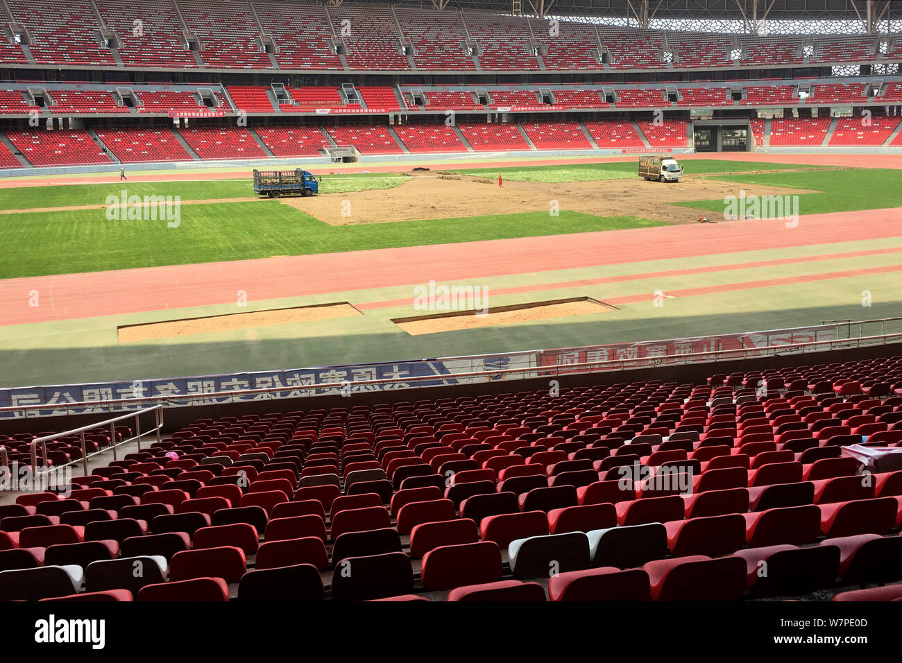 View of the football pitch being repaired at a sports stadium after it ...