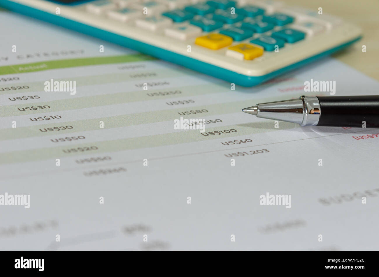 Business documents and calculators Pen on the desk Stock Photo - Alamy