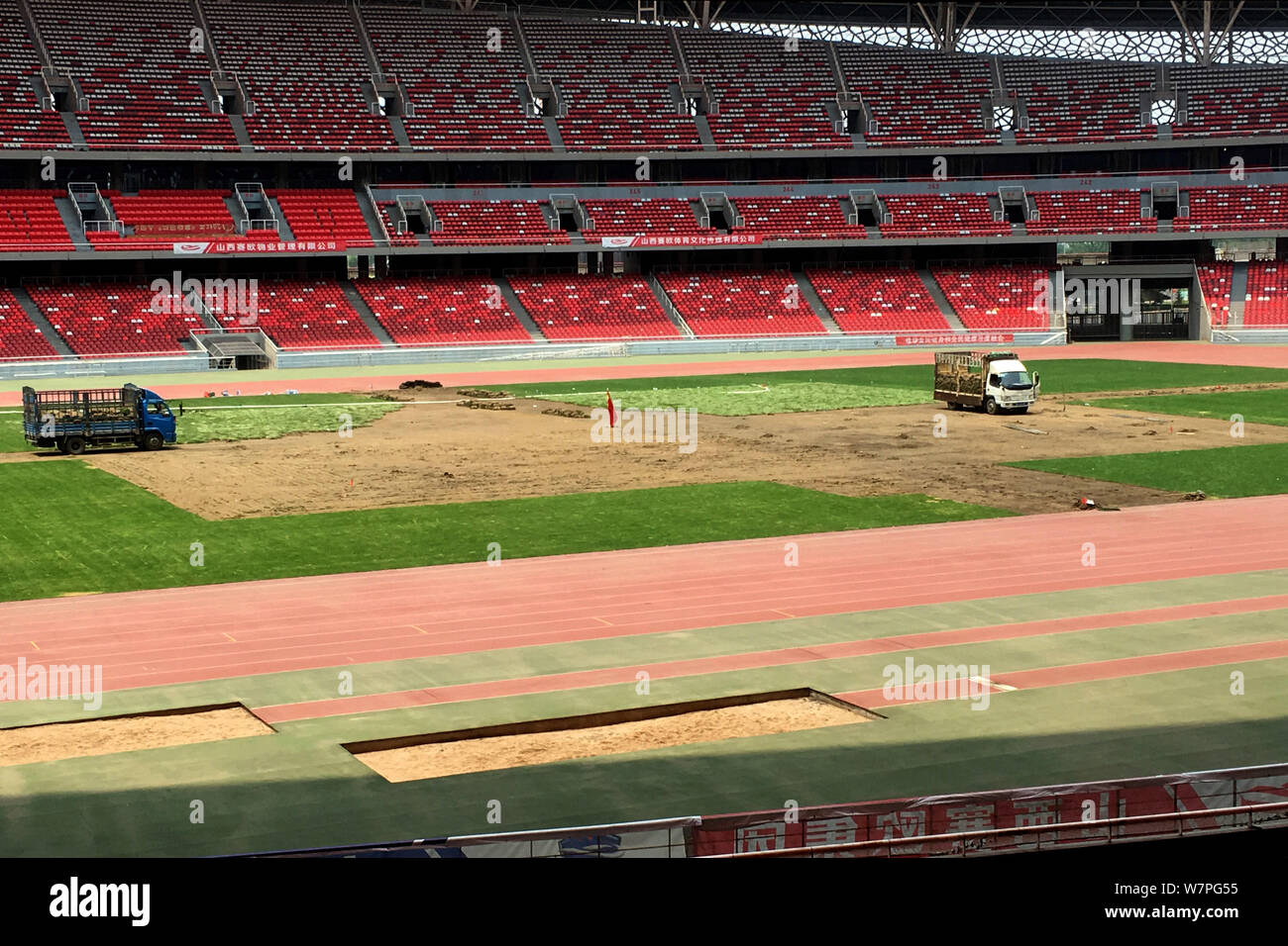 View of the football pitch being repaired at a sports stadium after it ...