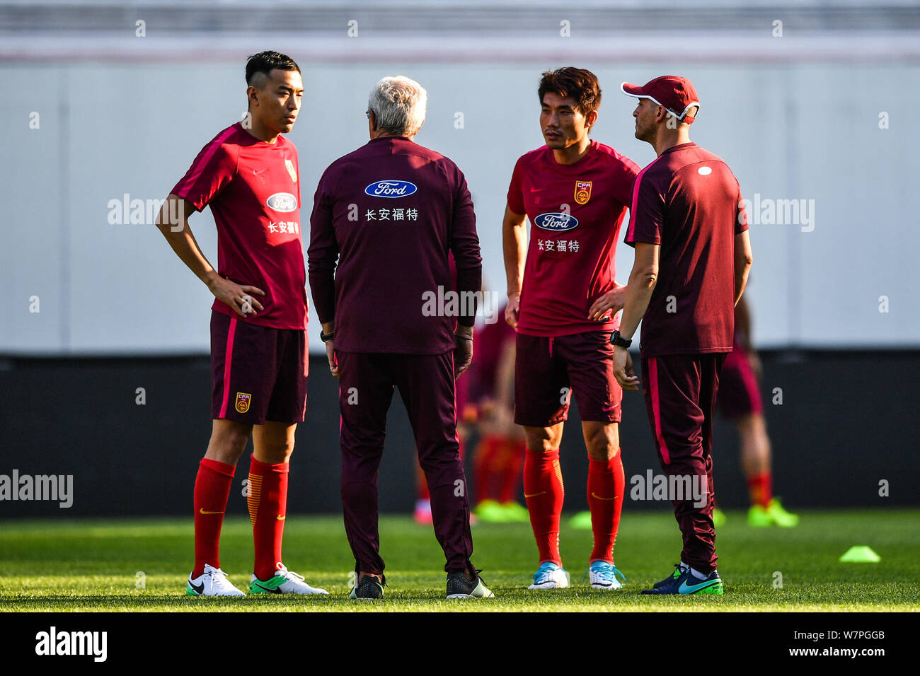 Players of Chinese national football team take part in a training ...