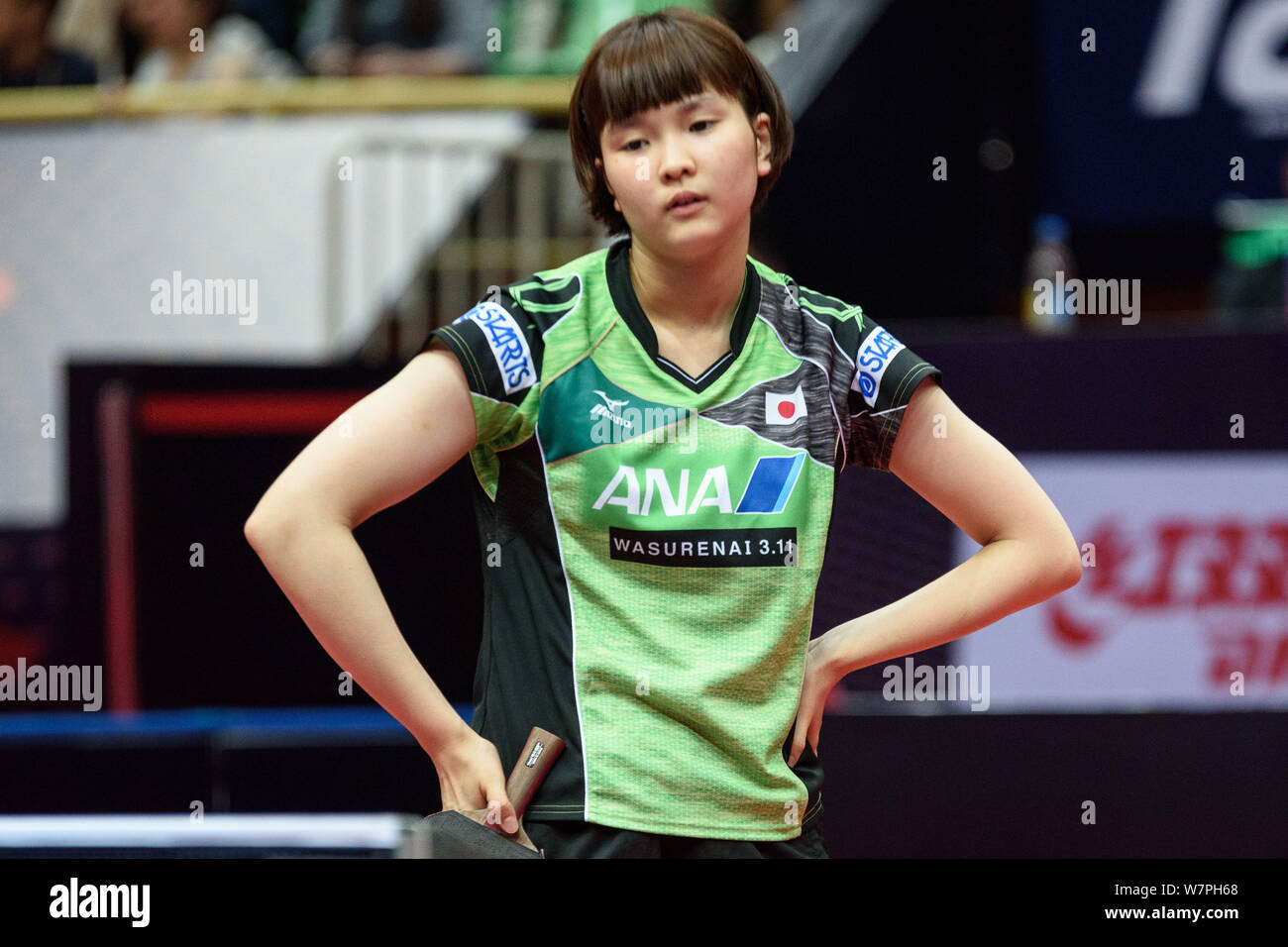Honoka Hashimoto of Japan reacts in the first round match of the Women ...