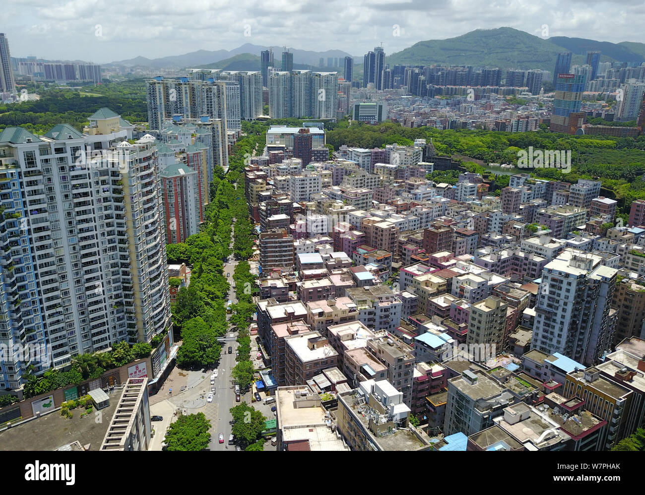 Aerial view of old residential houses and buildings in Baishizhou urban ...