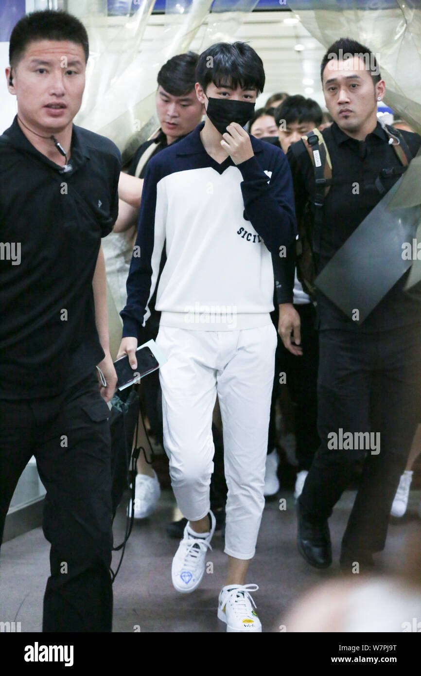 Karry Wang or Wang Junkai, center, of Chinese boy group TFBoys, is ...