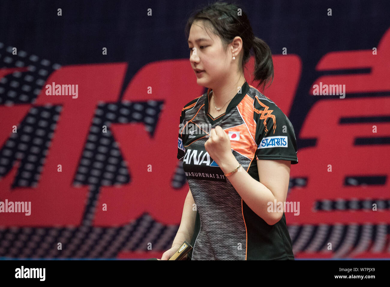 Yui Hamamoto of Japan reacts as she and Kasumi Ishikawa compete against ...