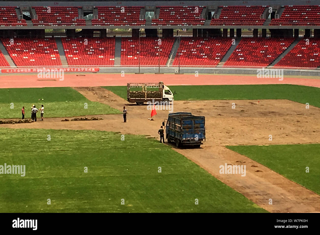 View of the football pitch being repaired at a sports stadium after it ...